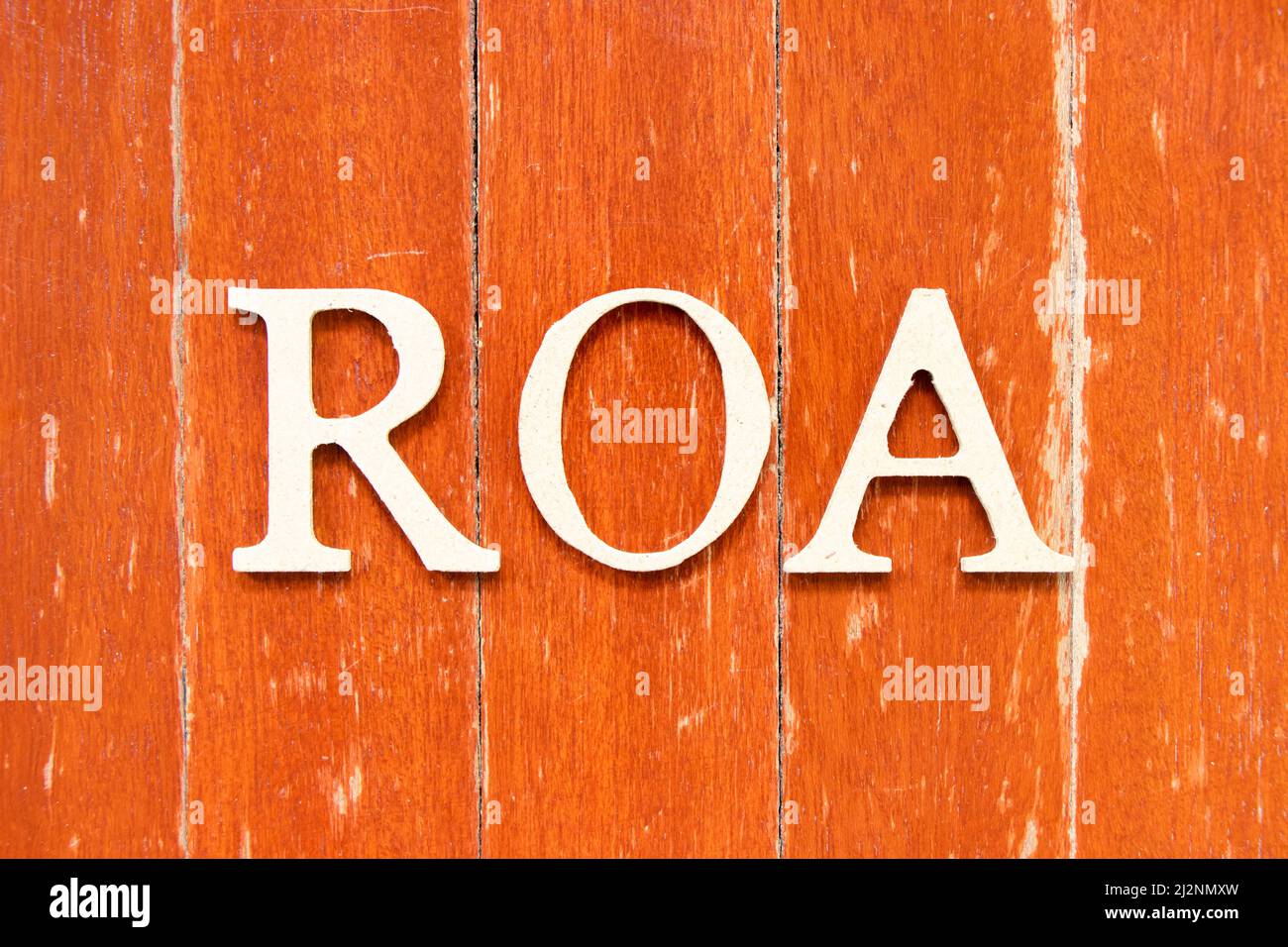 Alphabet letter in word ROA (Abbbreviation of Return on assets) on old ...