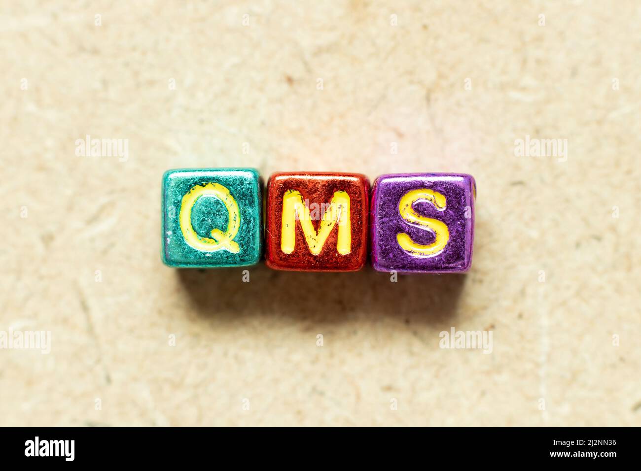 Metallic color alphabet letter block in word QMS (abbreviation of ...