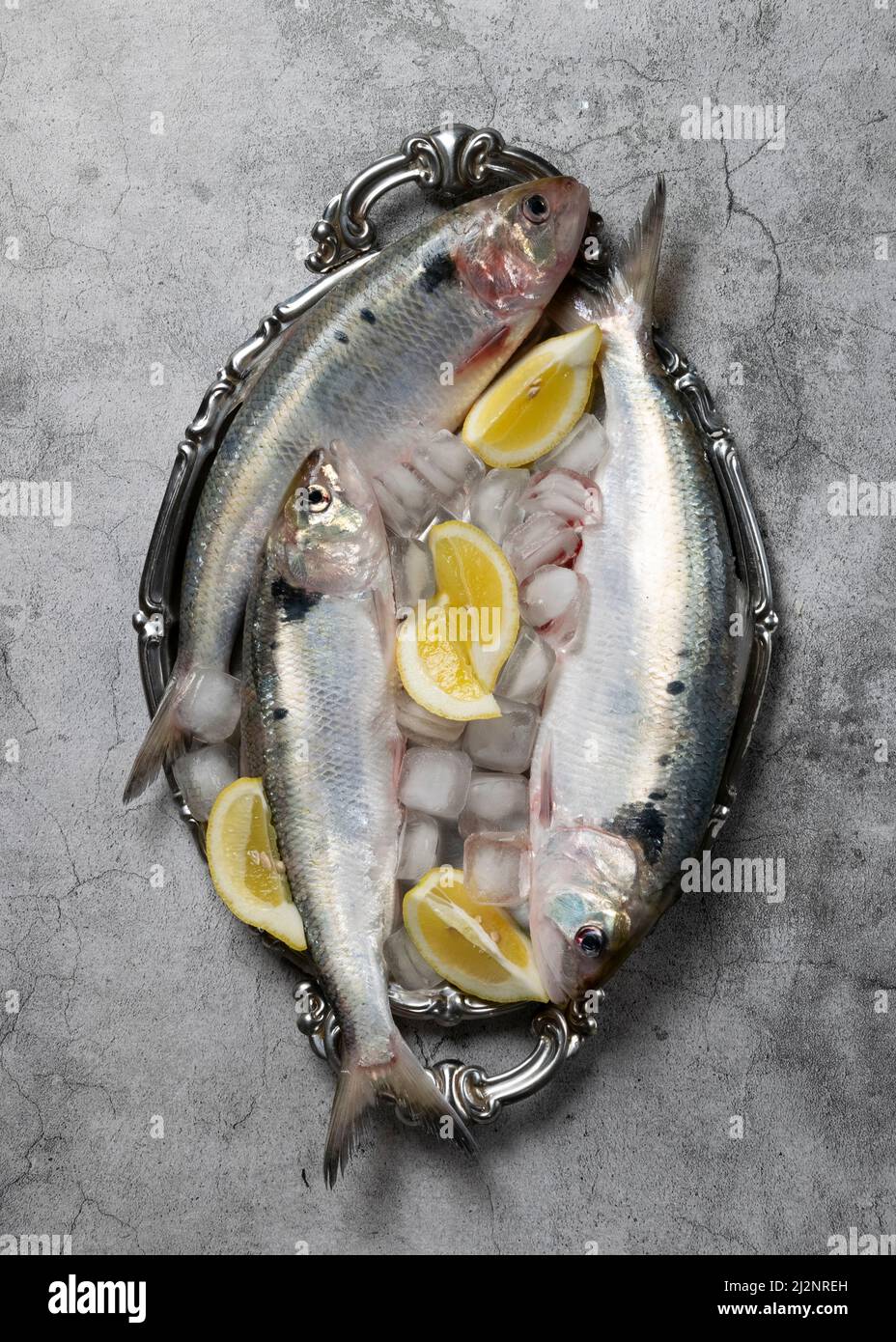 Fresh whole fish uncooked hi-res stock photography and images - Alamy