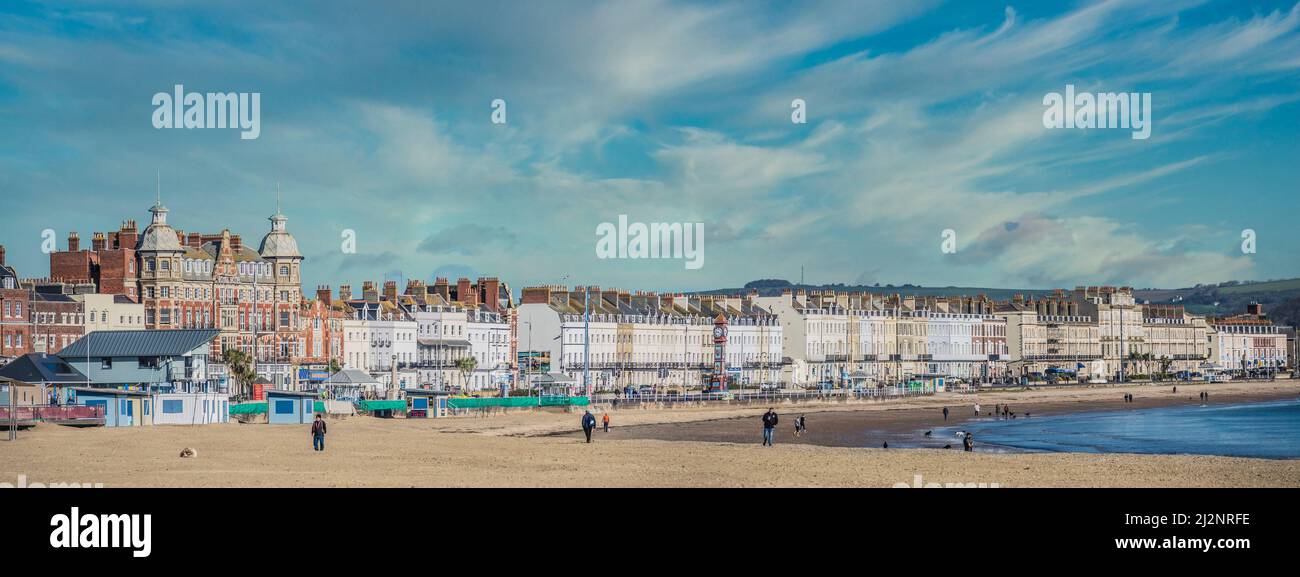 The scene is of Weymouth's famous beach used during WWII as a training ...