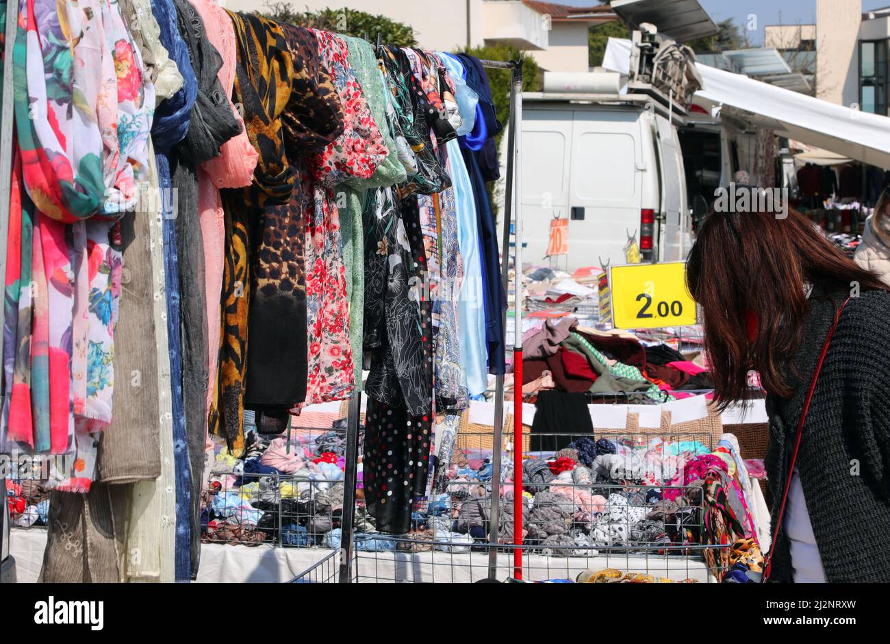 woman looking for clothes in the outdoor market stall on Sunday Stock ...