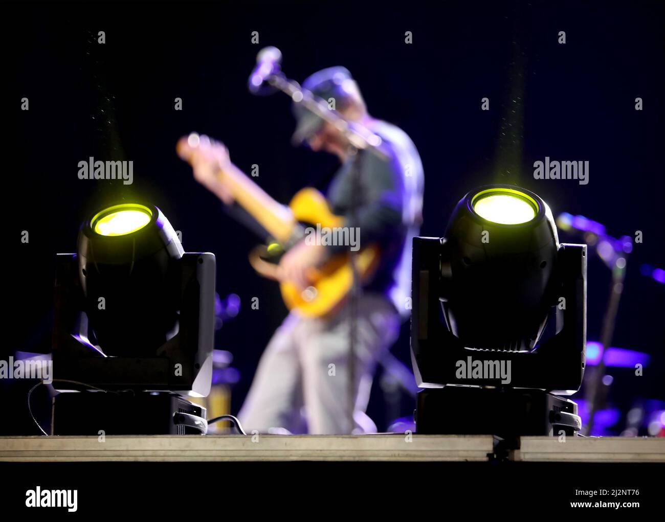 powerful spotlights with lights on stage during live concert and the ...