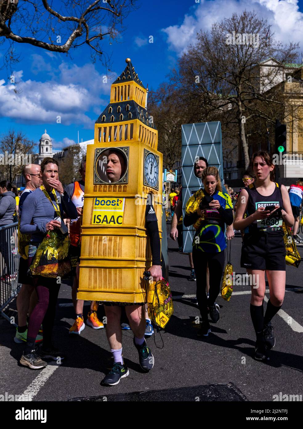 Runners dressed up as Big Ben after finishing during the 2022 London ...