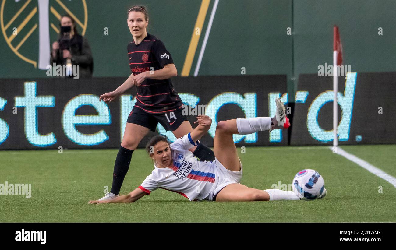 The Reign's Jimena Lopez slides to intercept a pass to the Thorn's ...