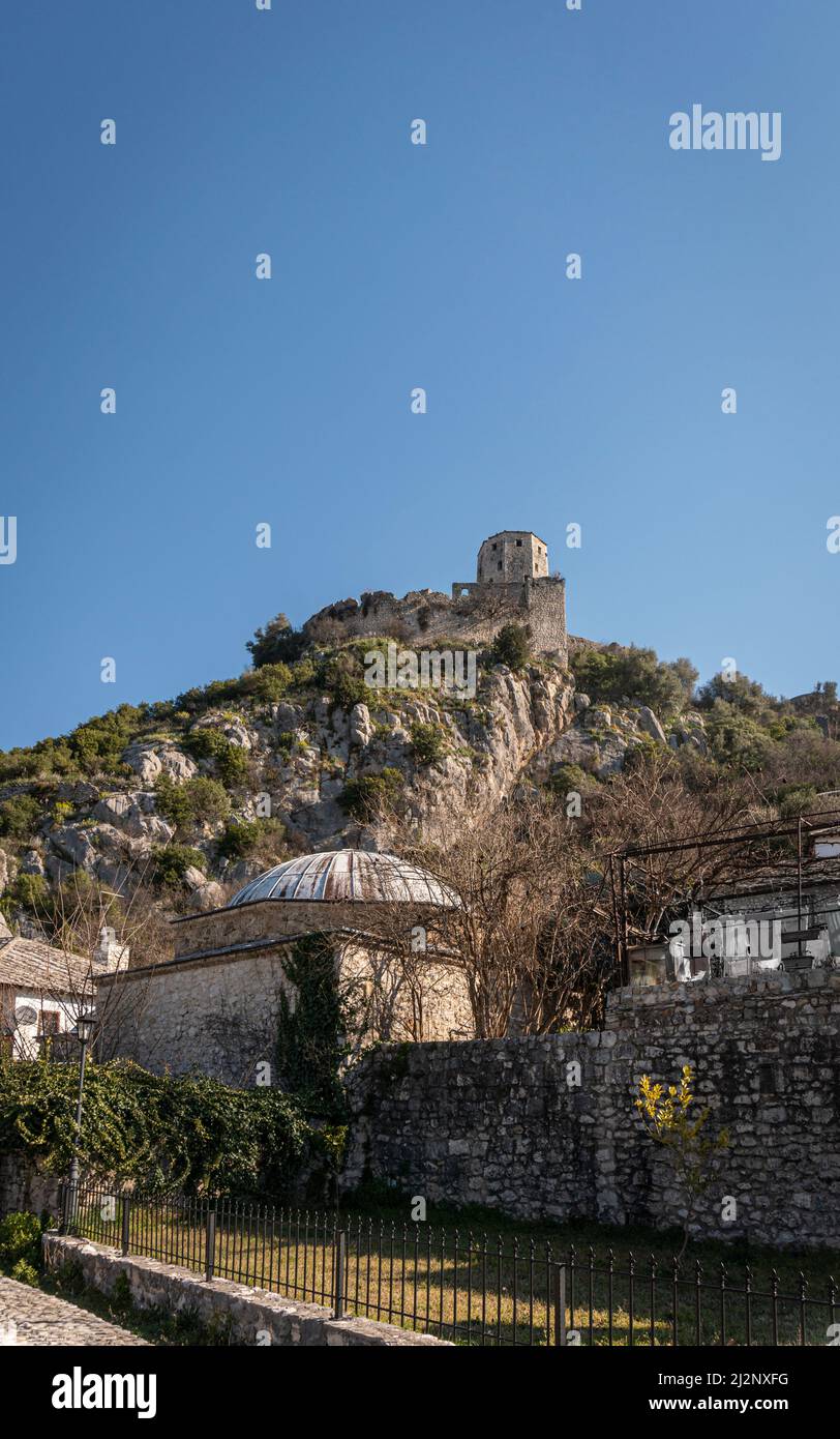 Domed roof of the madersa and fortress in Pocitelj medieval village in ...
