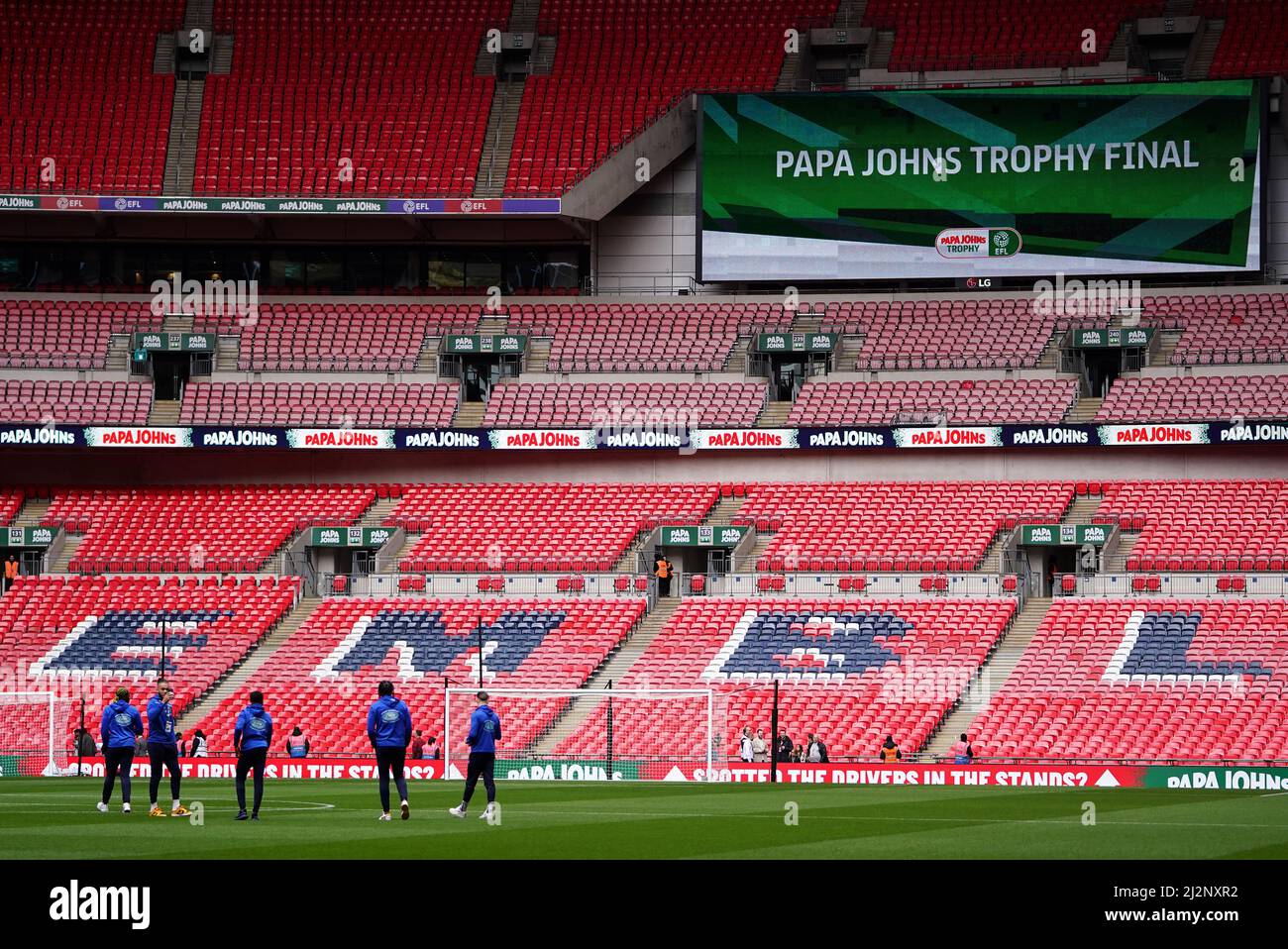 Sutton United players inspect the pitch before the Papa John's Trophy ...
