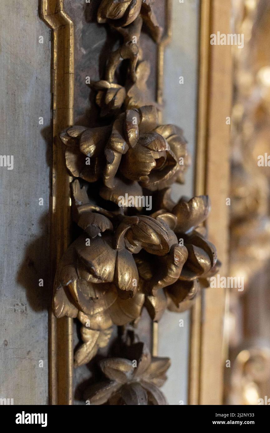 an old gothic gold frame wall decor in old architecture Stock Photo - Alamy