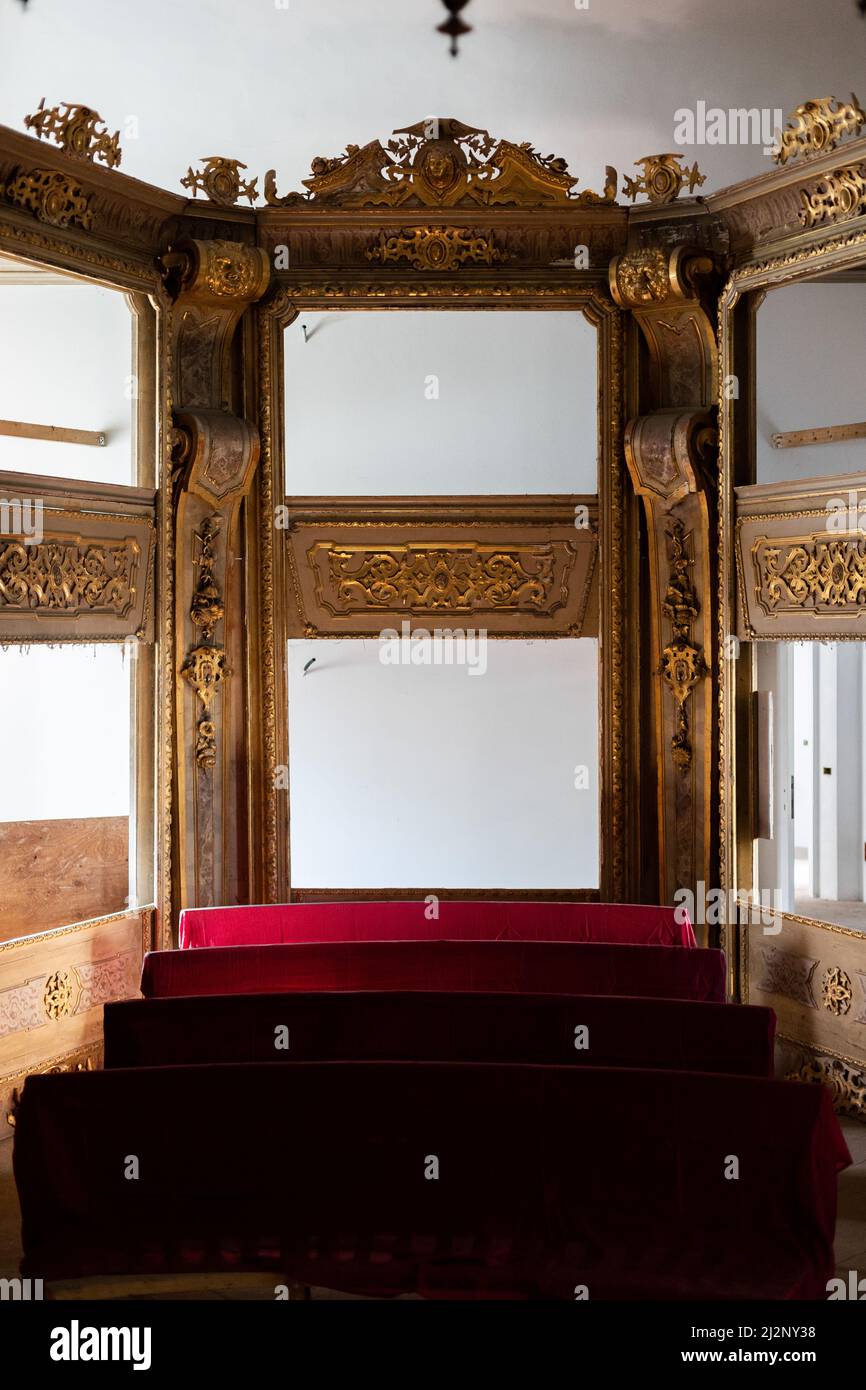 an old gothic gold frame wall decor in old architecture Stock Photo - Alamy