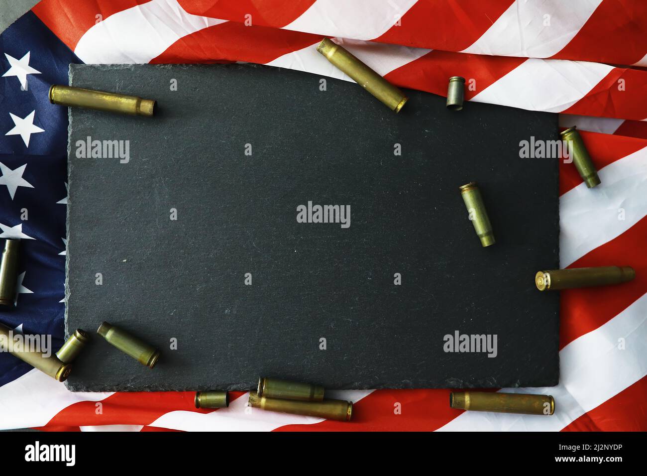 American flag on gray background. Military background with bullets. USA ...