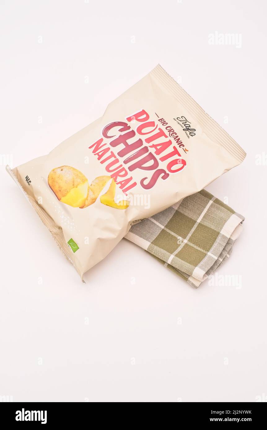 Natural potato chips in a plastic package - Snack and appetizer concept ...