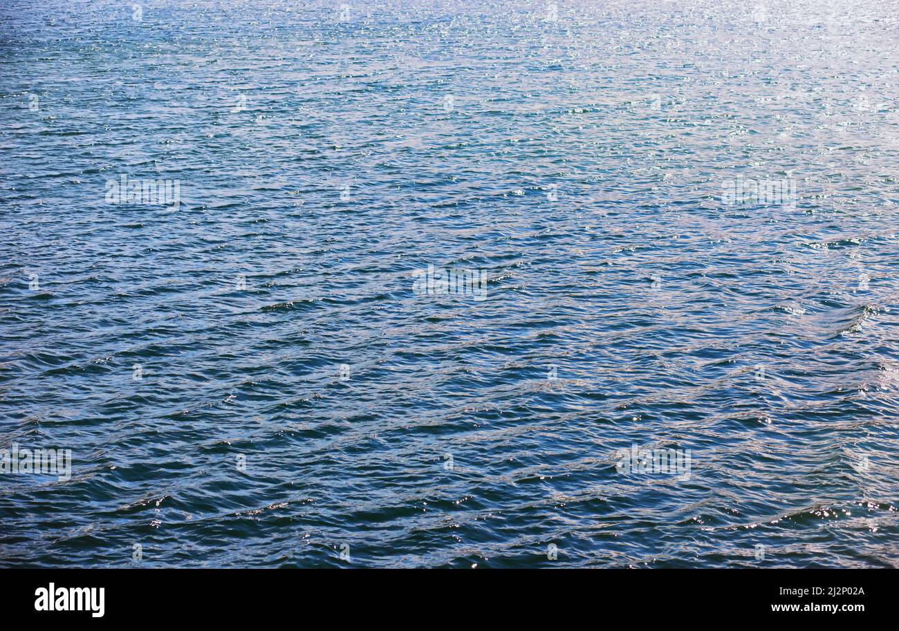 Water surface. The texture of the water. Waves on the lake windy ...