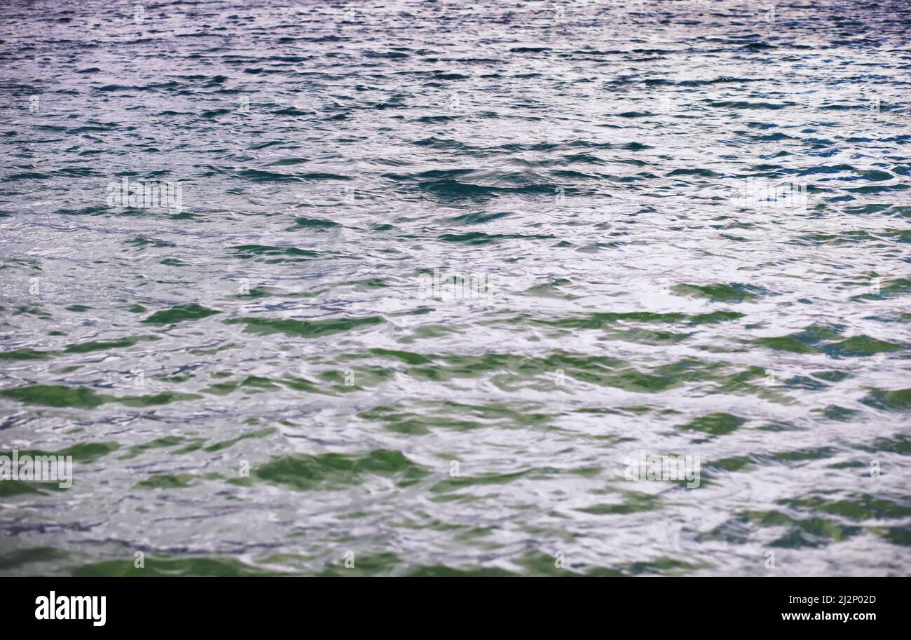 Water surface. The texture of the water. Waves on the lake windy ...