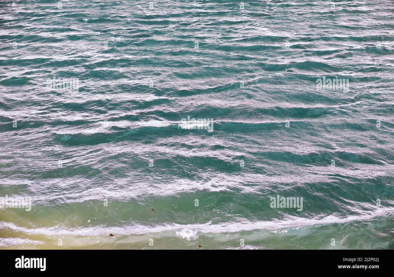 Water surface. The texture of the water. Waves on the lake windy ...