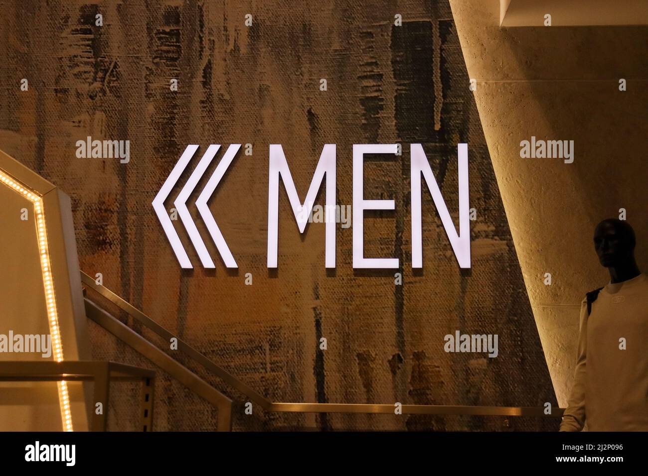Men's department direction sign / Illuminated MEN sign Stock Photo - Alamy