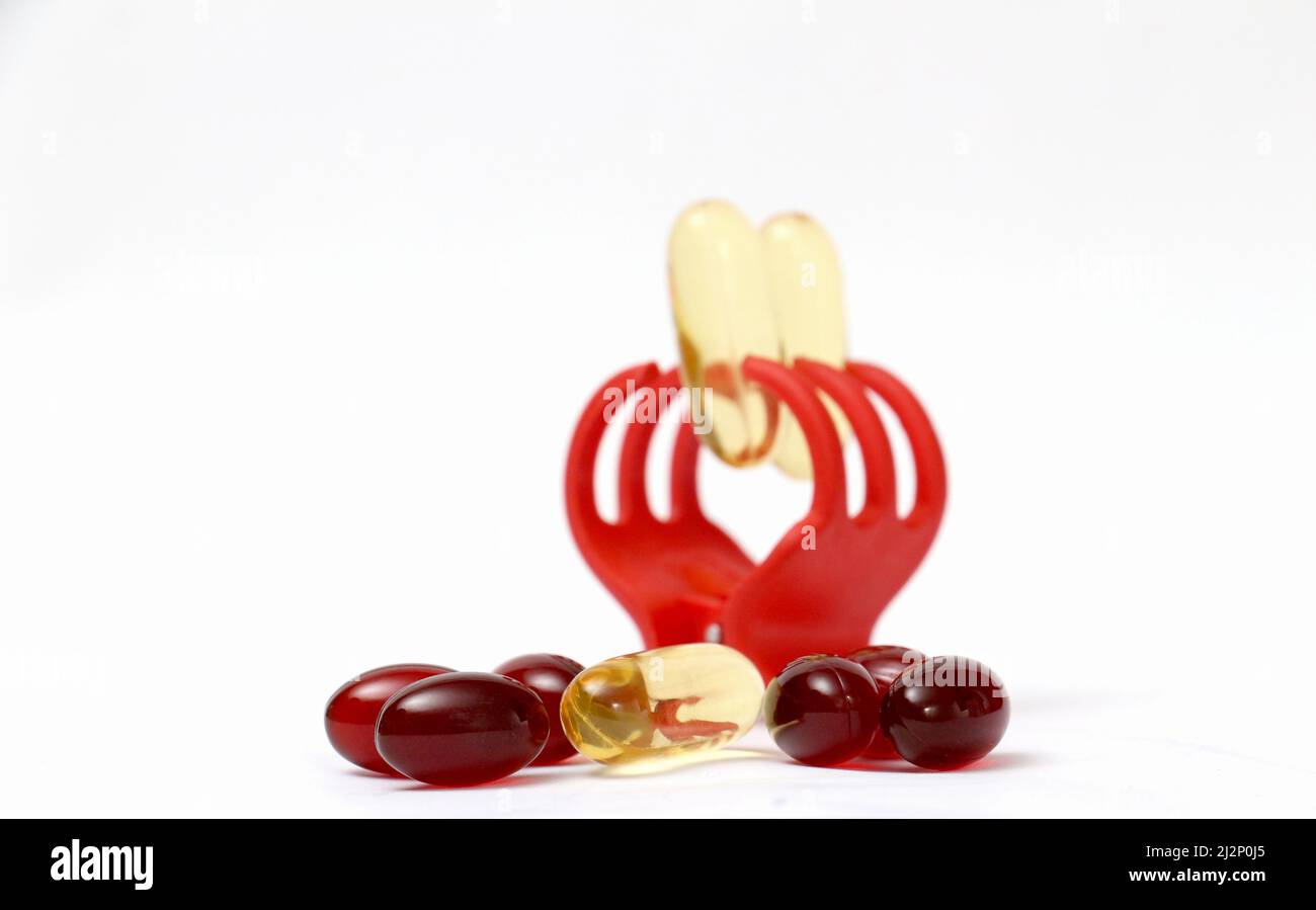 Cod liver oil omega 3 gel capsules isolated on white background Stock ...