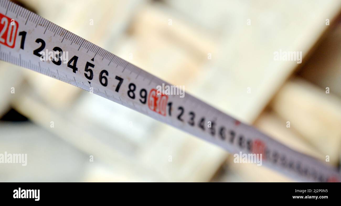 Picture of a Tape measure isolated on white background Stock Photo - Alamy