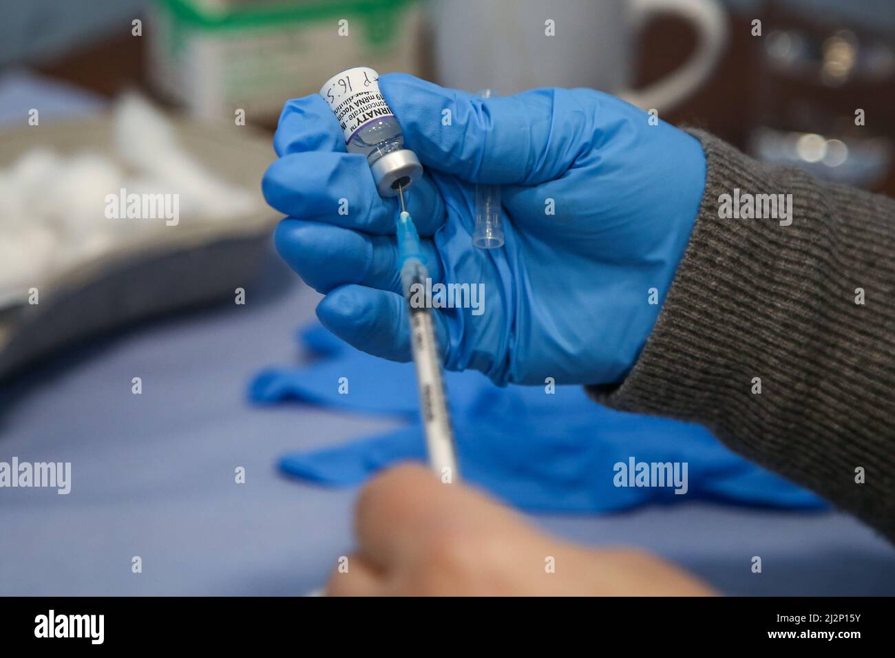 London, UK. 01st Apr, 2022. A NHS vaccinator draws the Pfizer COVID-19 ...