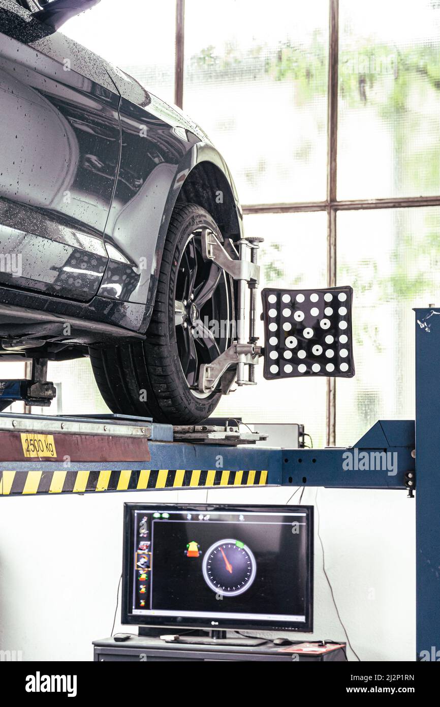 fixing your car at the garage by a mechanic Stock Photo - Alamy