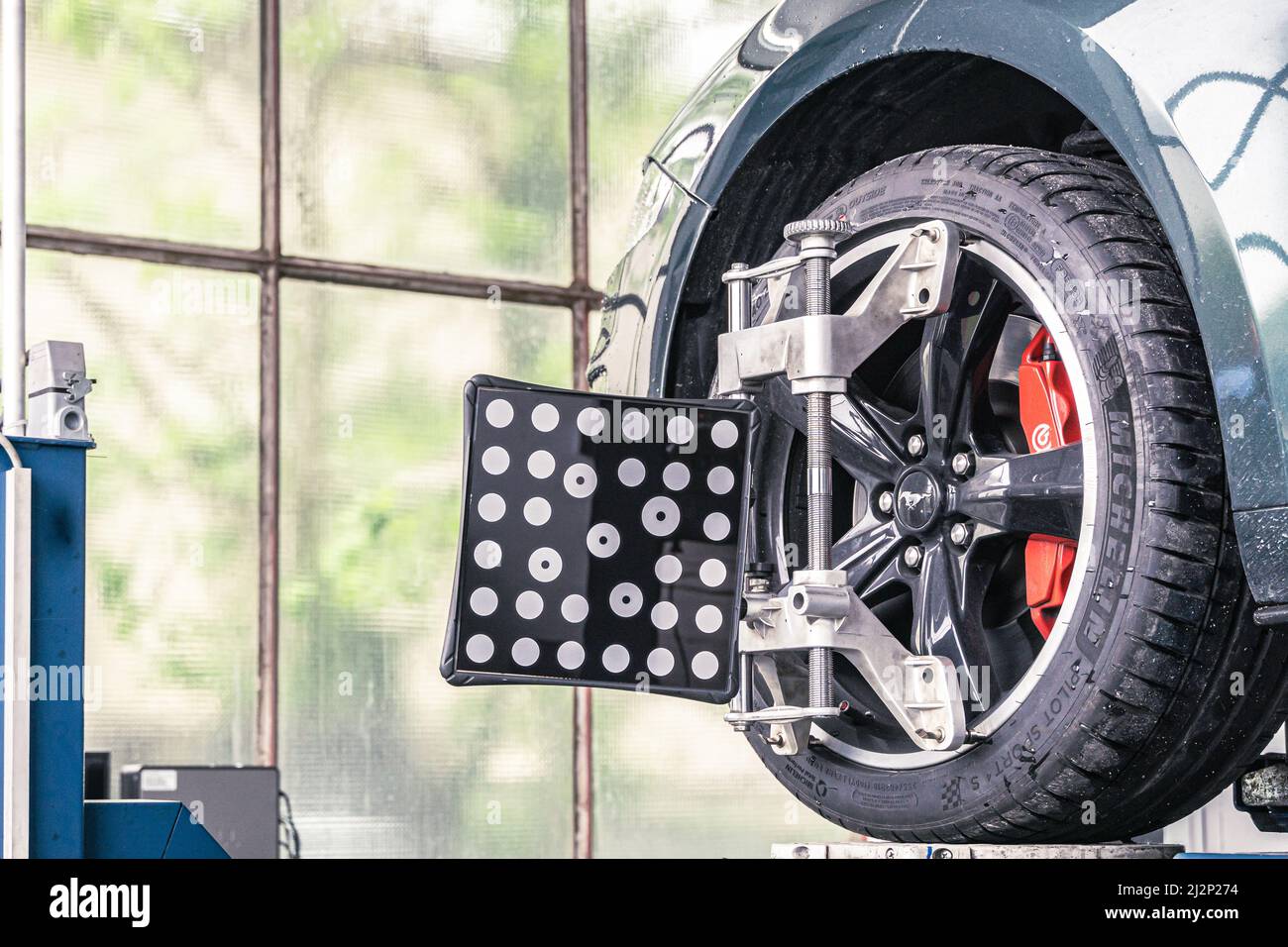 fixing your car at the garage by a mechanic Stock Photo - Alamy