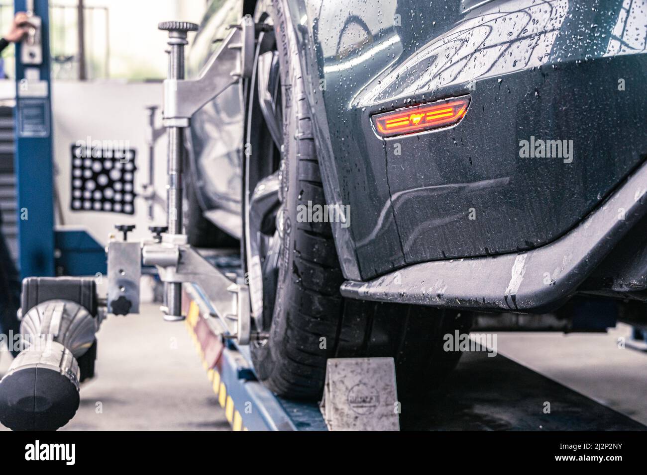 fixing your car at the garage by a mechanic Stock Photo - Alamy