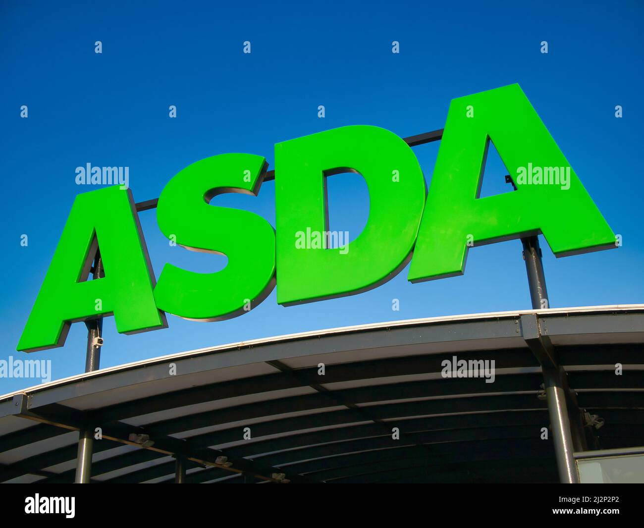 Corporate signage at a store of the ASDA British supermarket chain ...