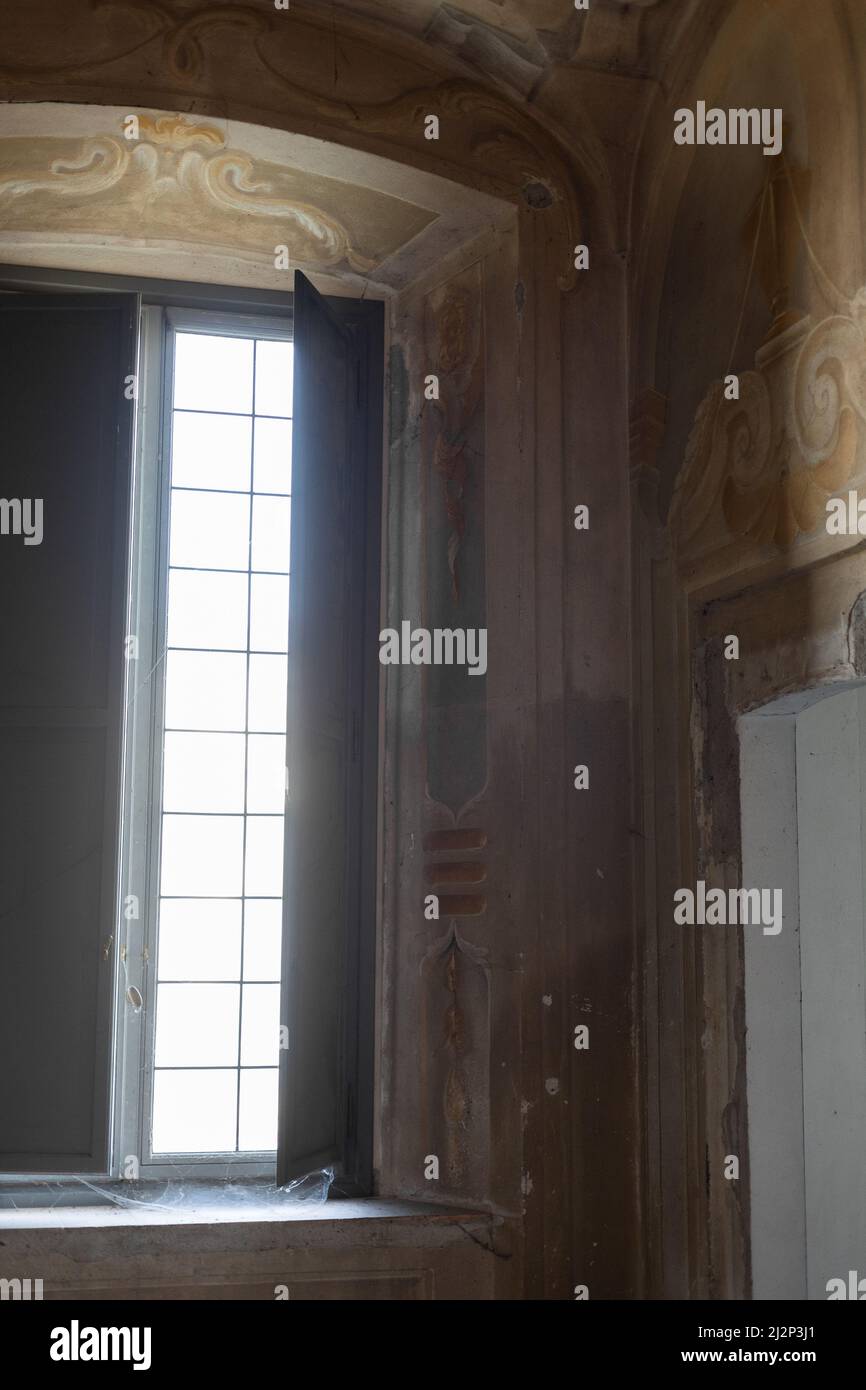 an old vintage european architecture window inside the corridor Stock ...