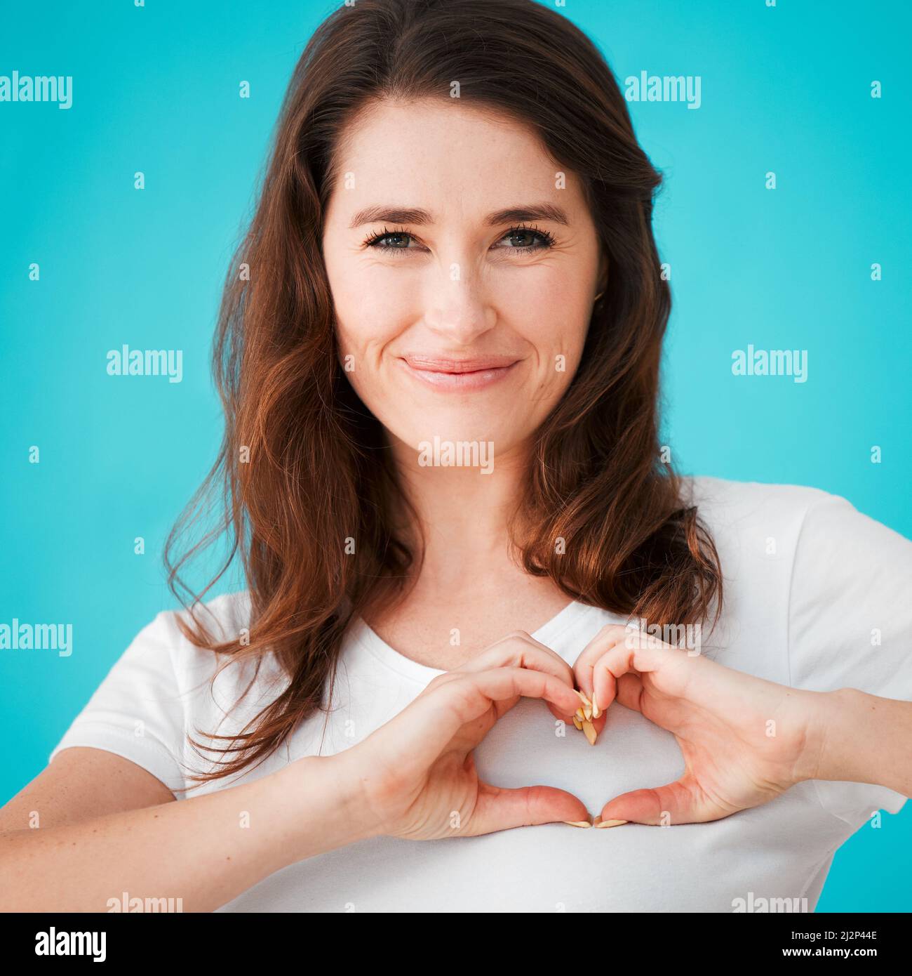 Woman hands over her chest hi-res stock photography and images - Alamy