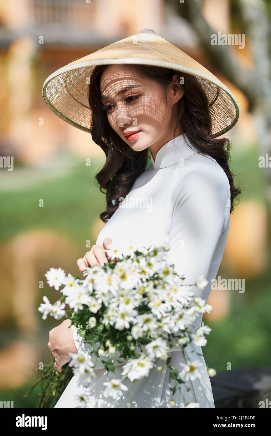 Ho Chi Minh city, Viet Nam: Ao Dai is traditional dress of vietnam, beautiful vietnamese woman ...