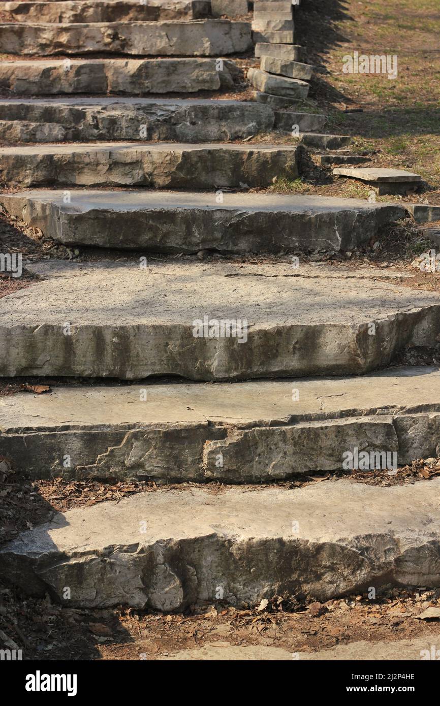 The random pattern of vintage limestone stairs in the park Stock Photo ...