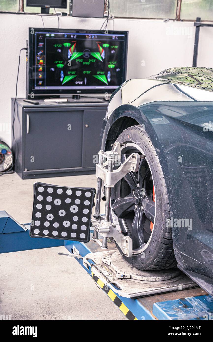 Mechanic fixing car suspension hi-res stock photography and images - Alamy