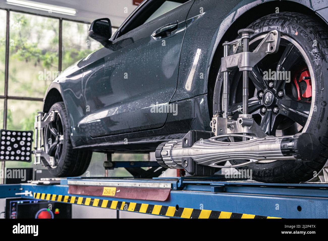 fixing your car at the garage by a mechanic Stock Photo - Alamy