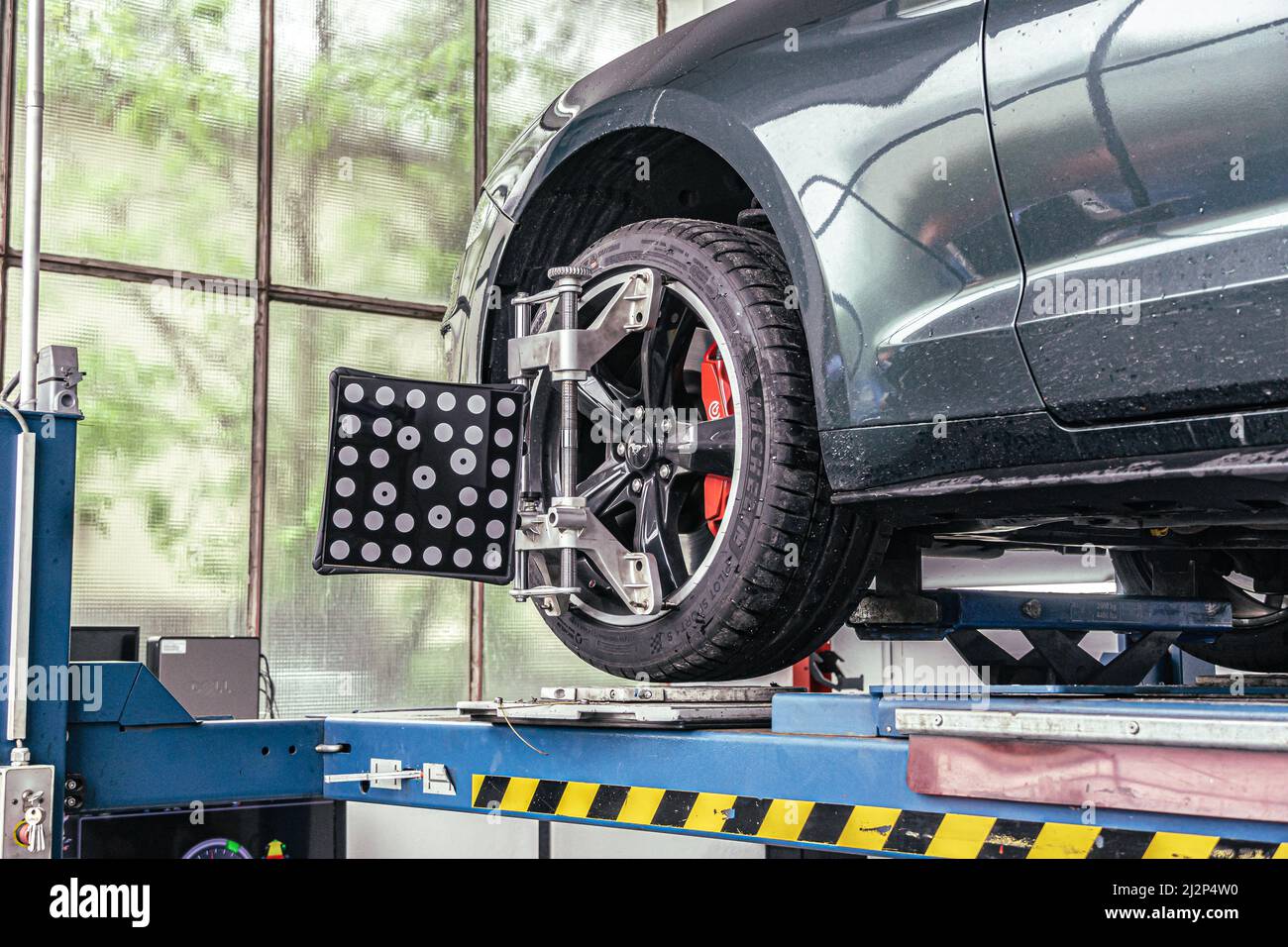 fixing your car at the garage by a mechanic Stock Photo - Alamy