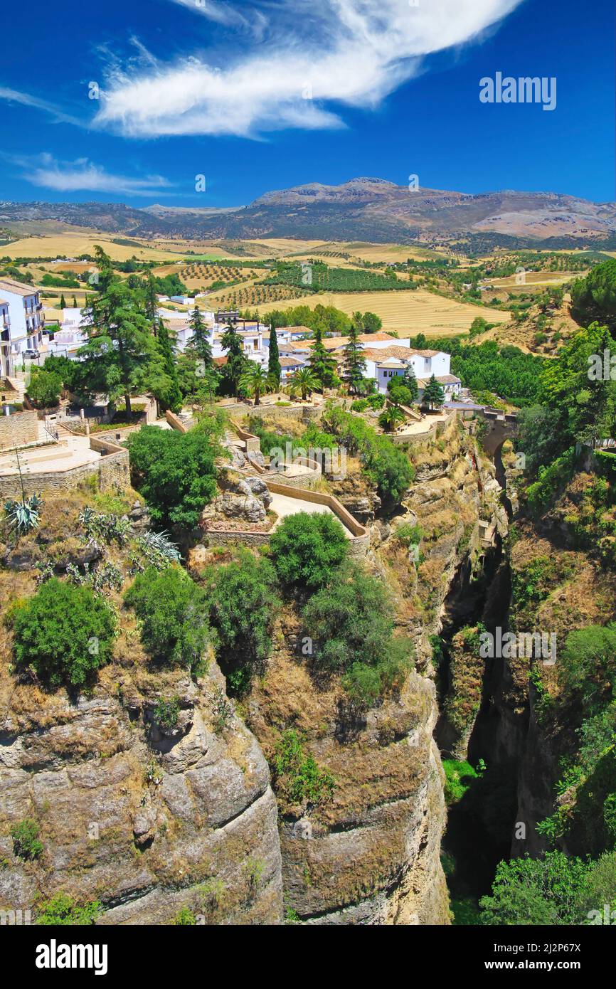 View on ancient village Ronda located precariously close to the edge of ...