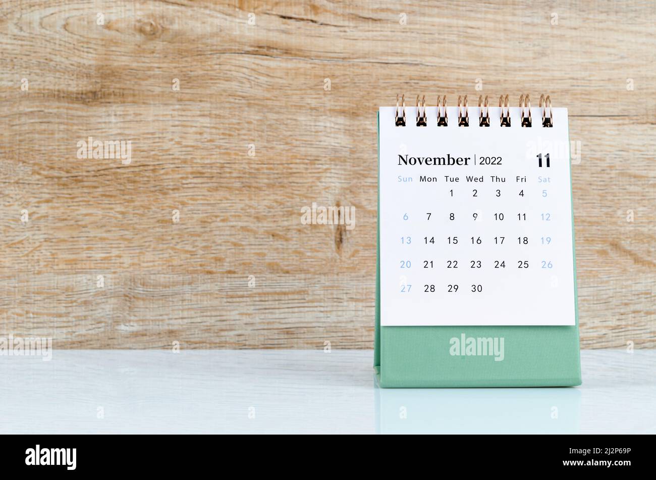 The November 2022 desk calendar on wooden background Stock Photo - Alamy