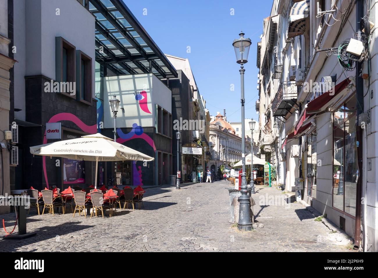 BUCHAREST, ROMANIA - AUGUST 17, 2021: Typical street and building at ...