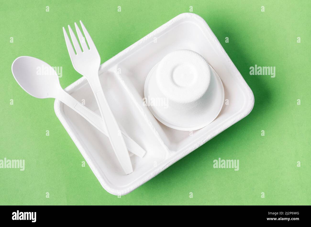 Eco friendly biodegradable paper disposable for packaging food on green ...