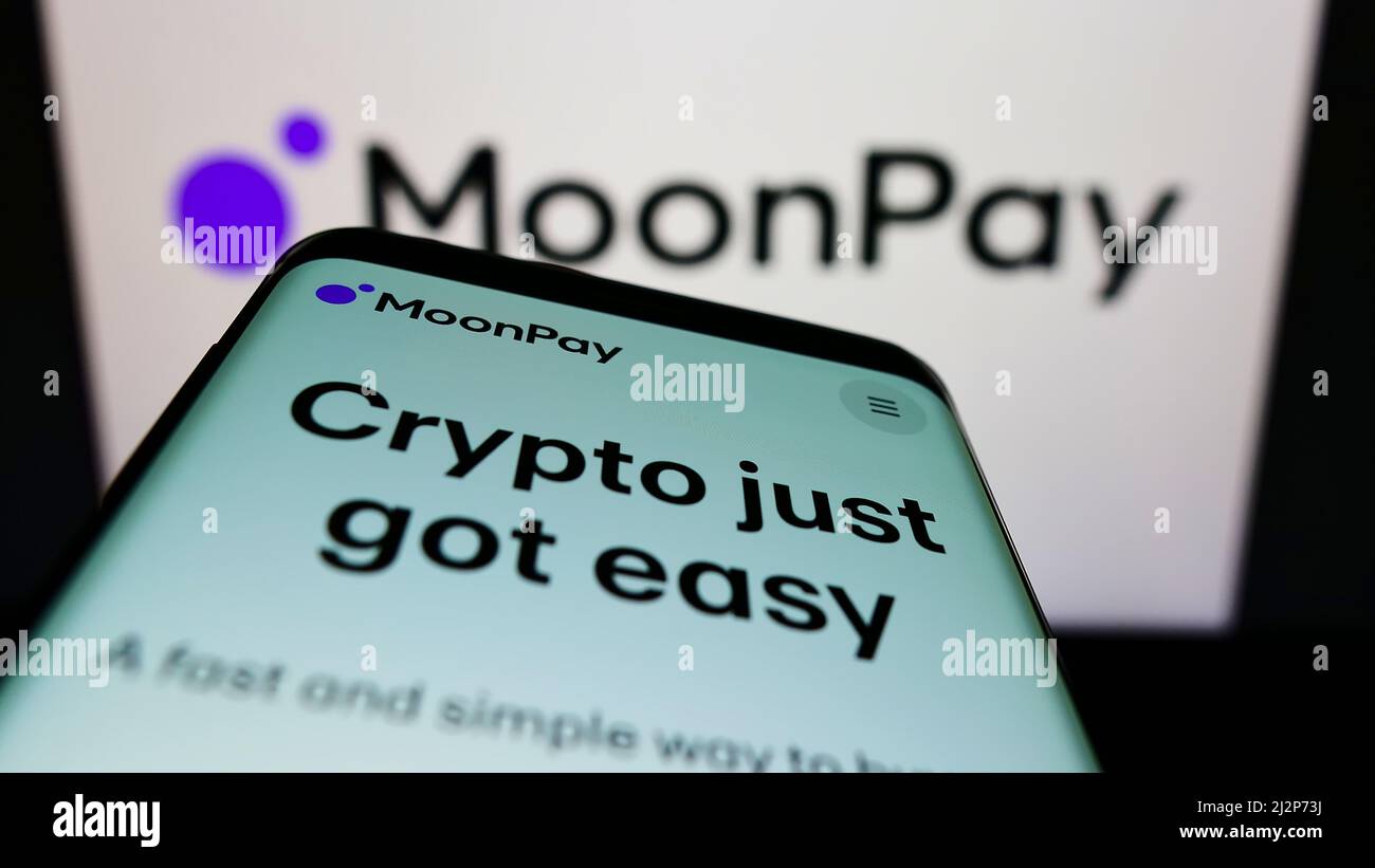Mobile phone with webpage of crypto company Moon Pay PTE Limited ...