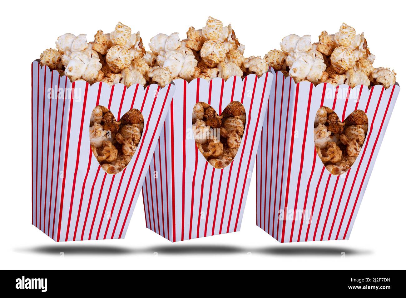 Love popcorn concept with three popcorn boxes with love heart coutout ...