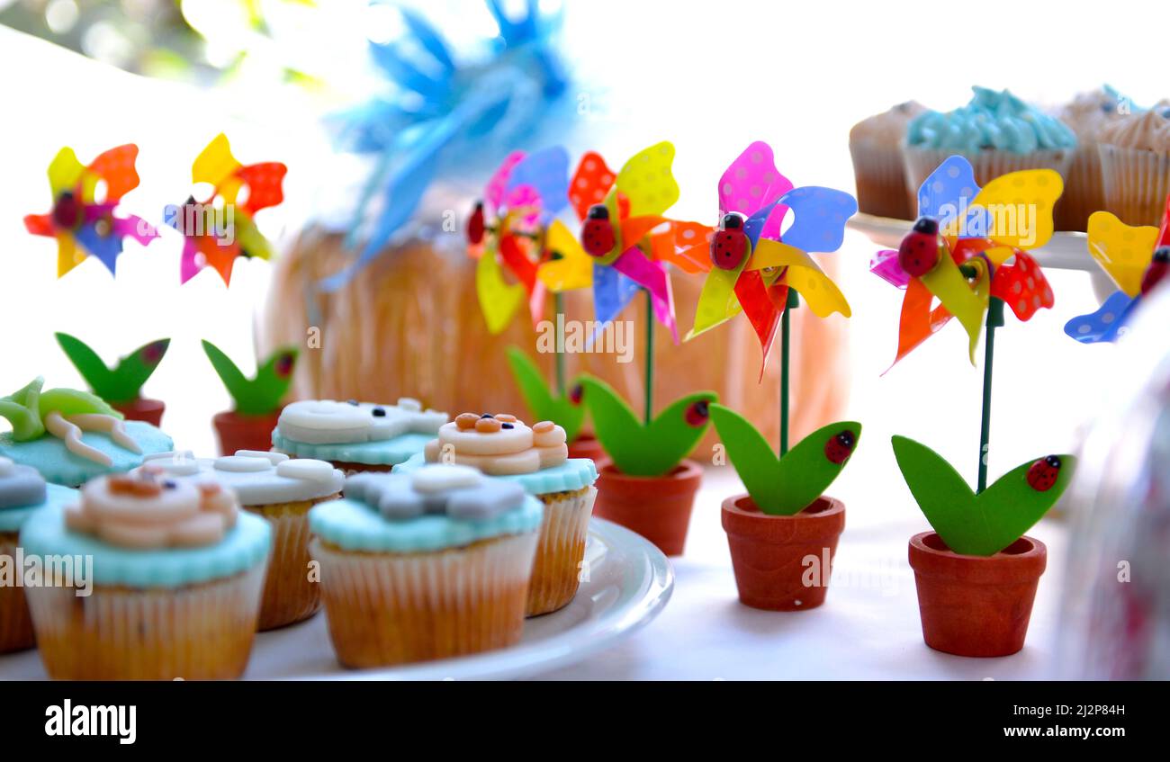 birthday cupcakes on a well decorated table Stock Photo - Alamy