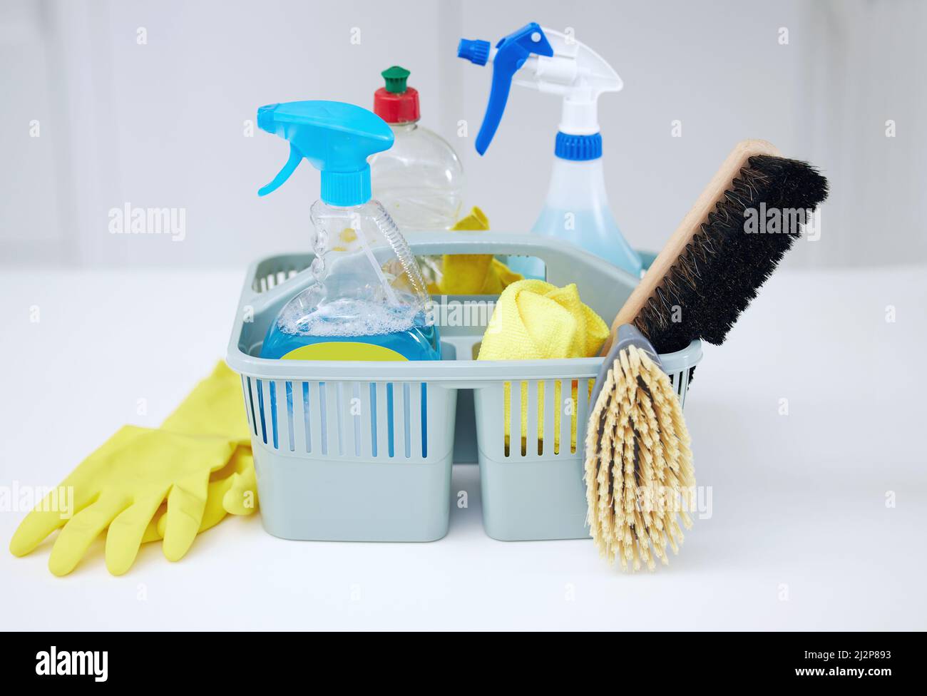 Plastic basket with cleaning supplies hi-res stock photography and ...