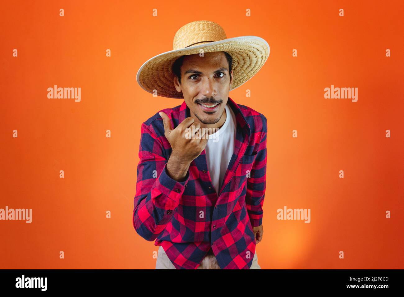 Black Man With Junina Party Outfit with thubs up Isolated on Orange ...