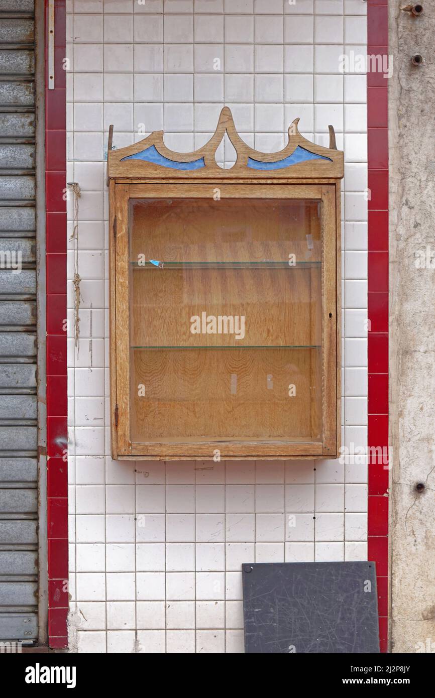 Empty wooden window shelf at building exterior wall with tiles Stock ...
