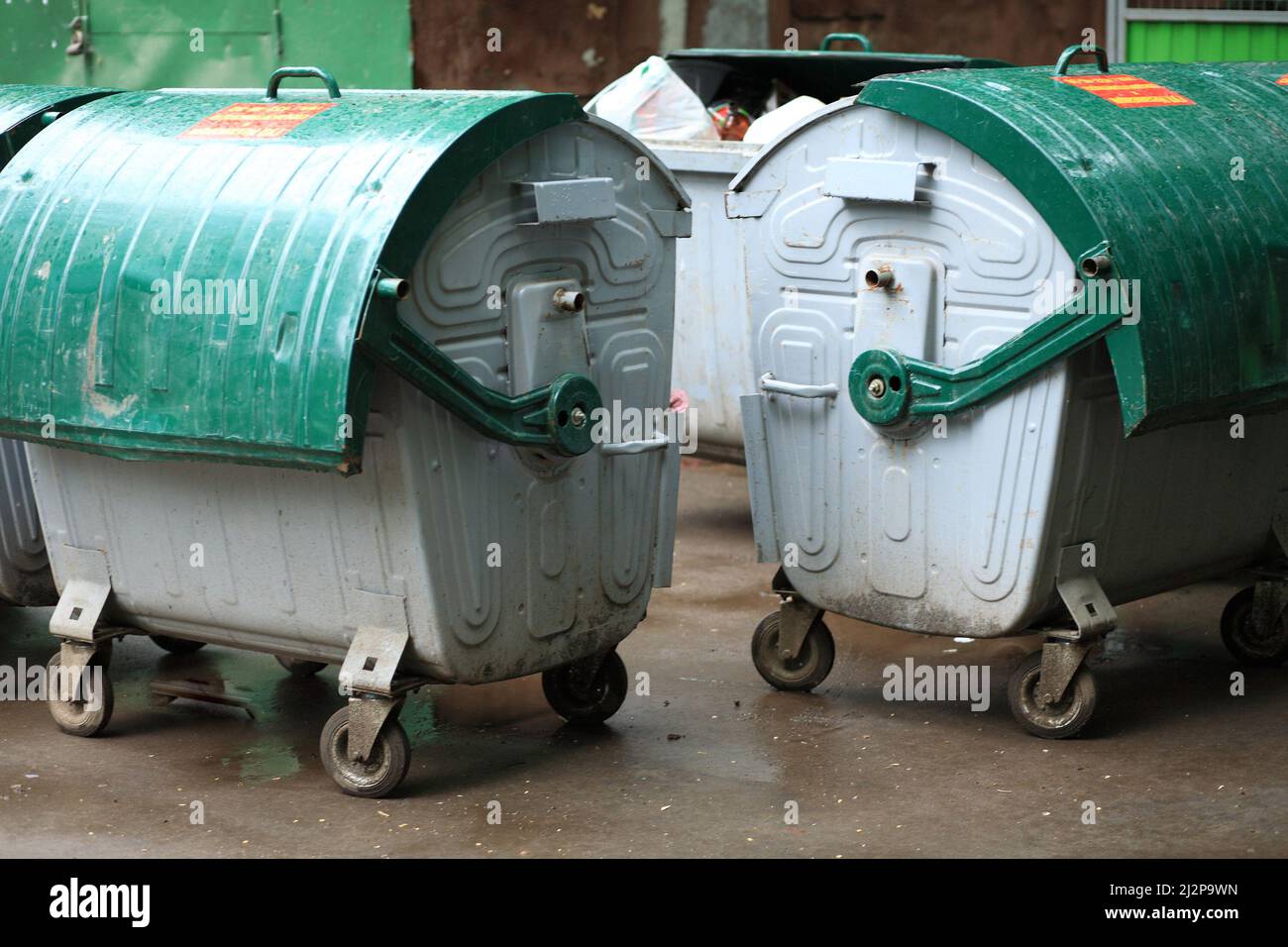 green dustbin at rain Stock Photo - Alamy