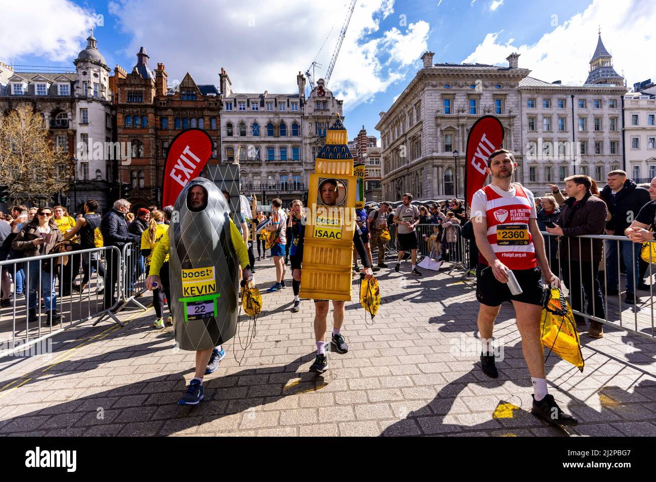 Runners dressed up as the Gherkin and Big Ben after finishing during ...