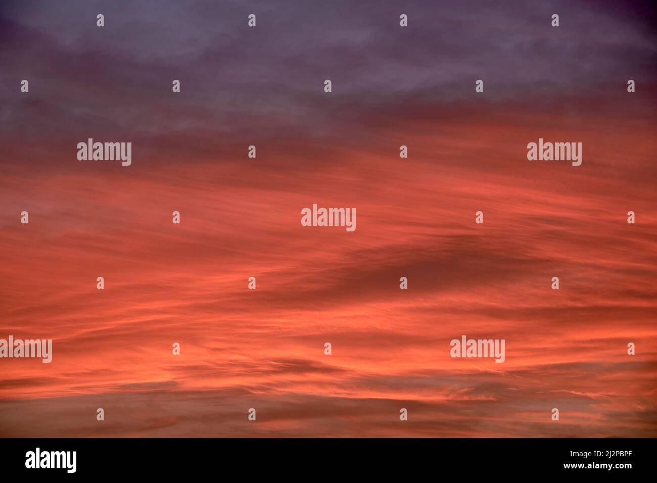 Sunset. Heaven, orange sky Sun rays Wallpaper Clouds Stock Photo - Alamy