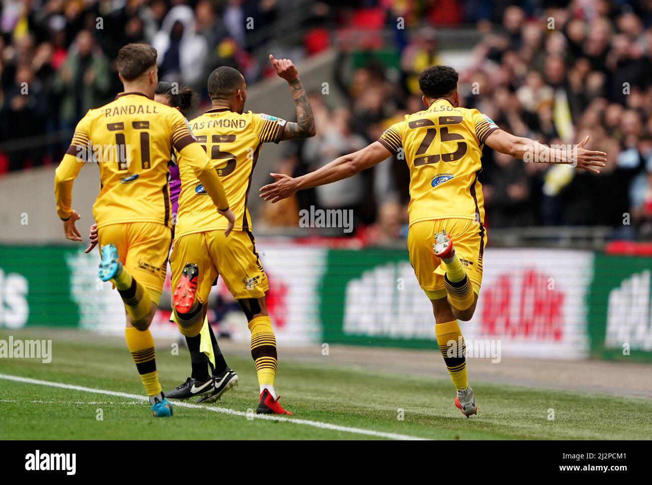 Sutton United's Donovan Wilson (right) celebrates scoring their side's ...