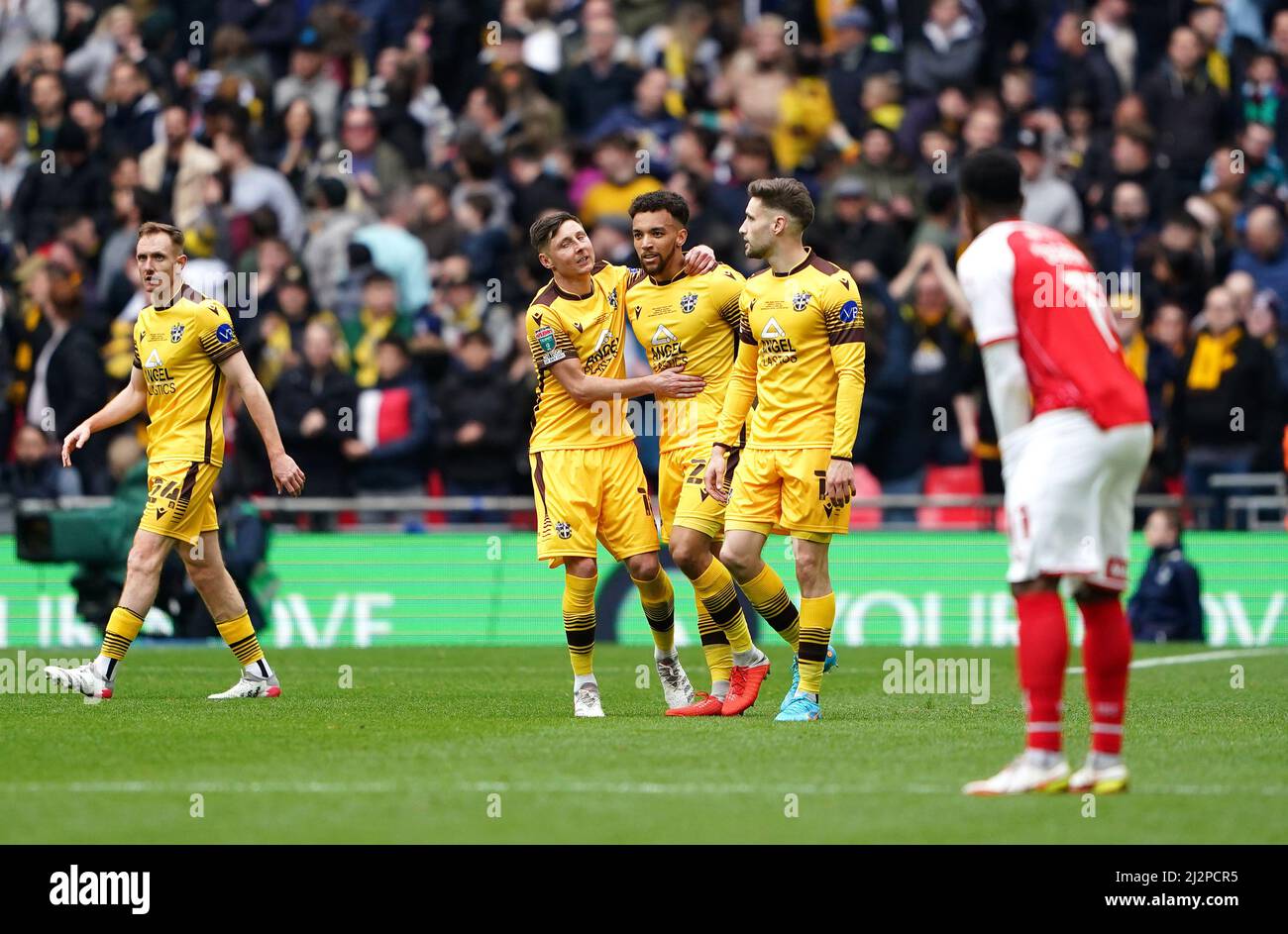 Sutton United's Donovan Wilson (centre) celebrates scoring their side's ...