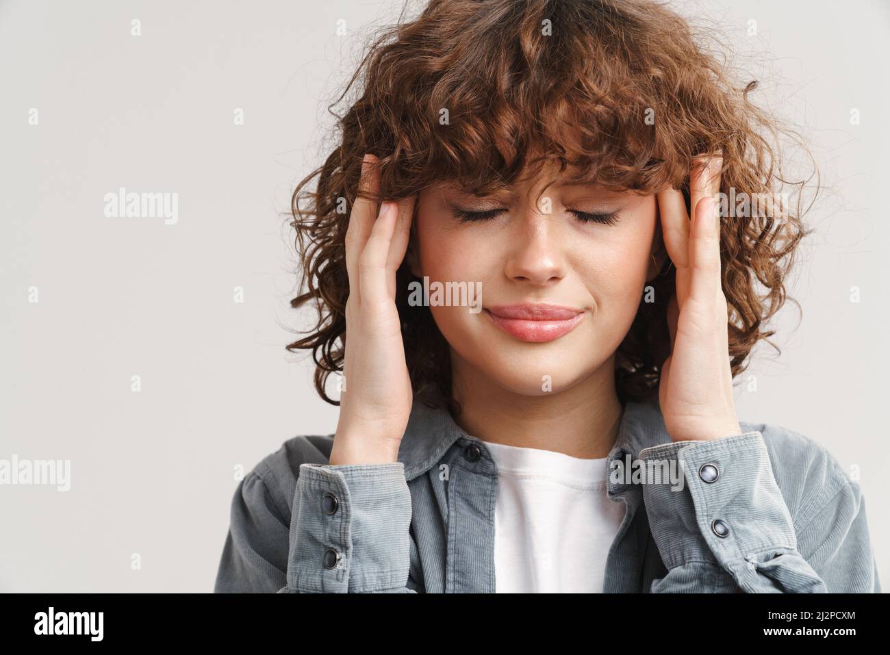 Rub rubbing temples hi-res stock photography and images - Alamy