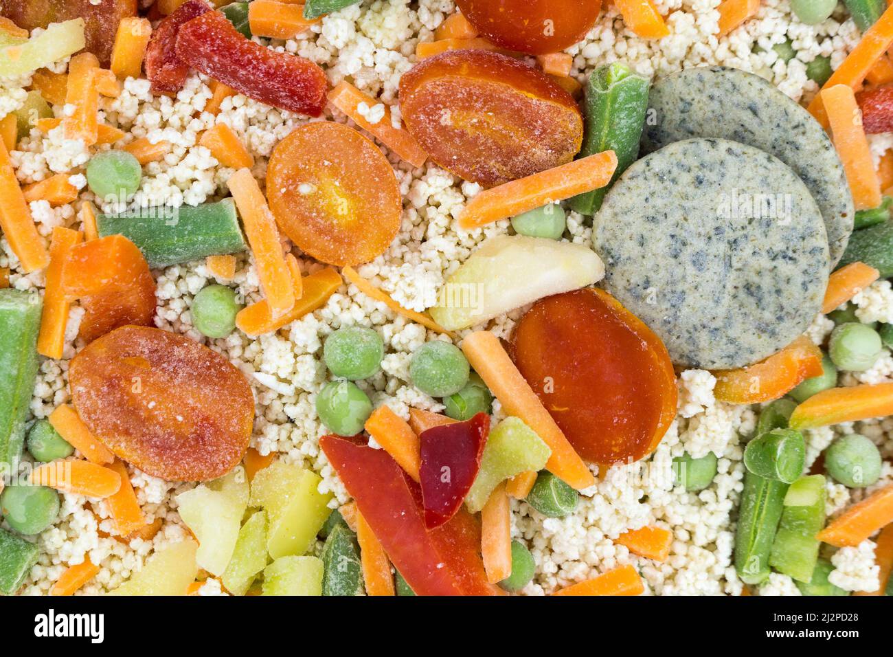 Frozen mix of couscous, vegetables and sauce for quick preparation ...