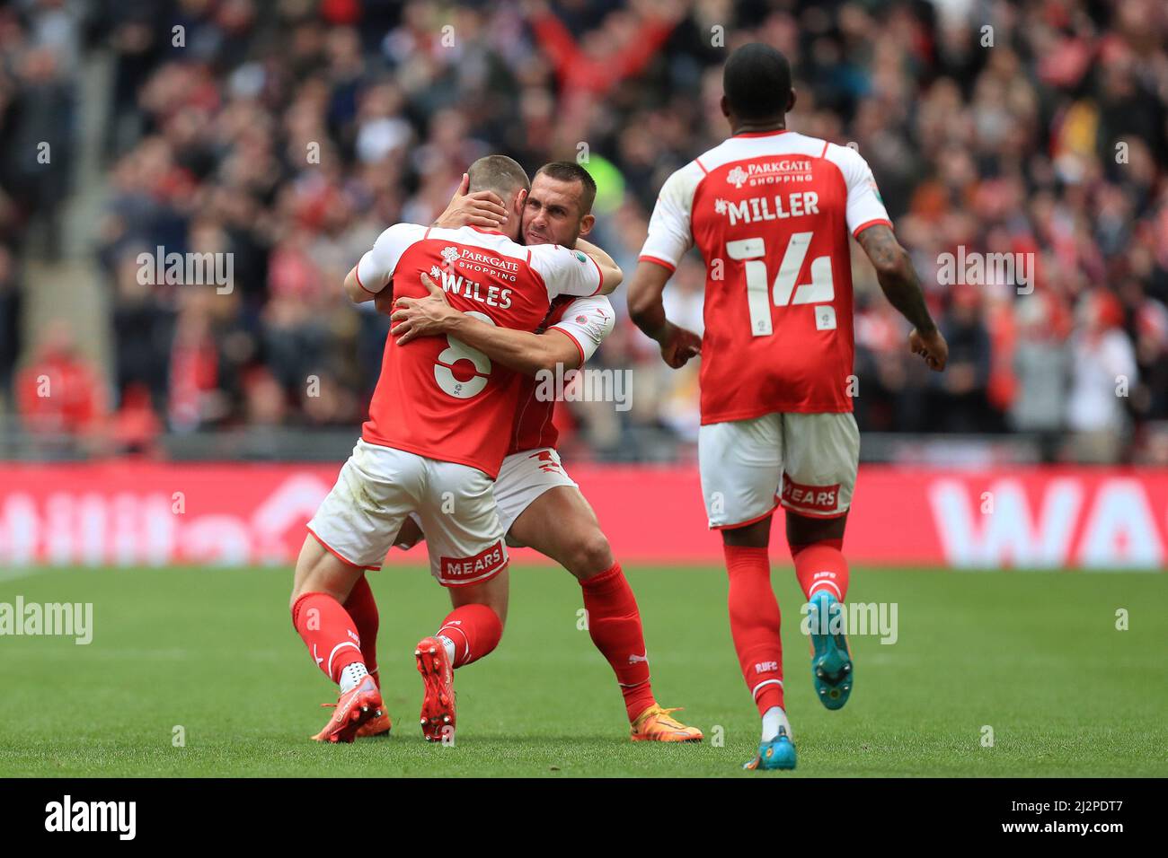 GOAL: Ben Wiles #8 of Rotherham United celebrates scoring with team ...